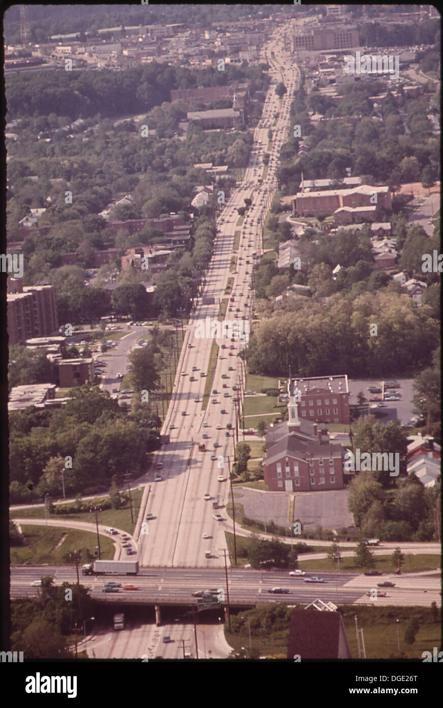 The image captures a highway leading into Washington, D.C ...