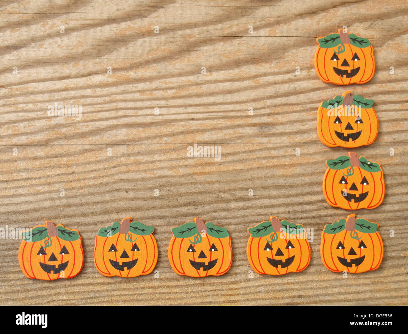 pumpkins on a board Stock Photo - Alamy