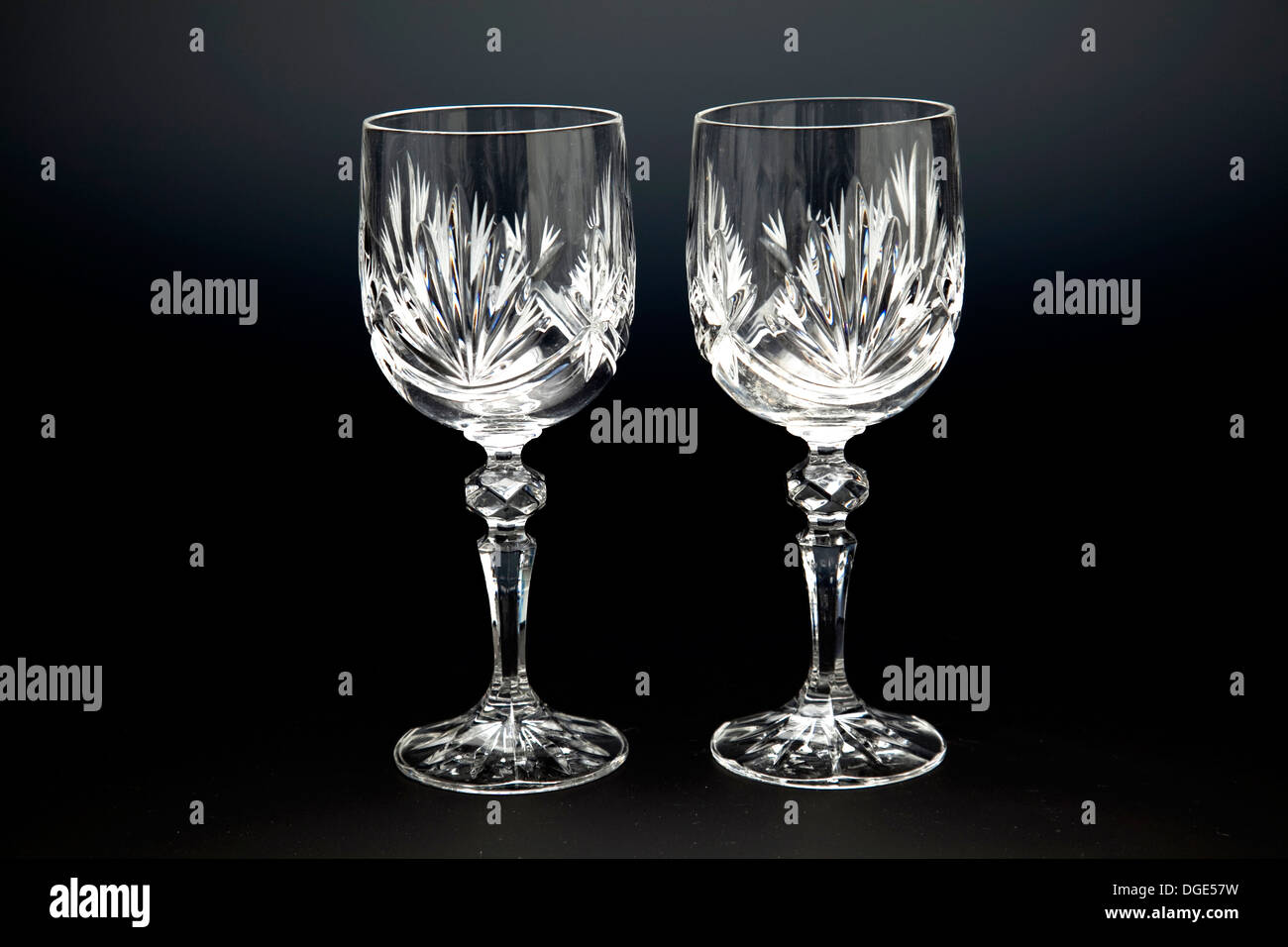 Two cut glass wine glasses Stock Photo - Alamy