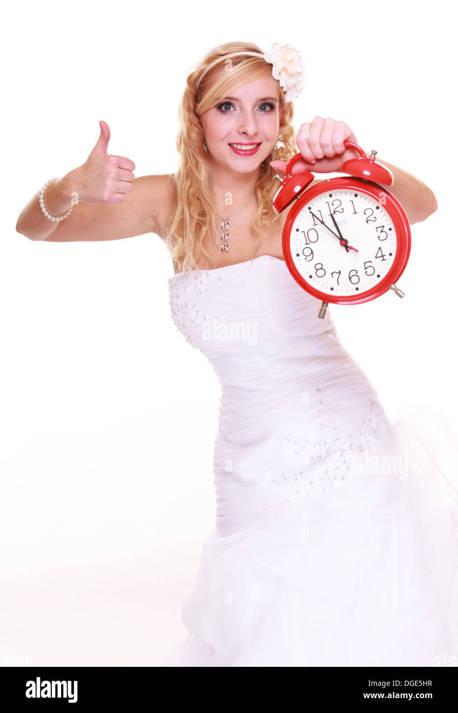 Wedding concept. Time to get married. Bride with wall clock. Beautiful ...
