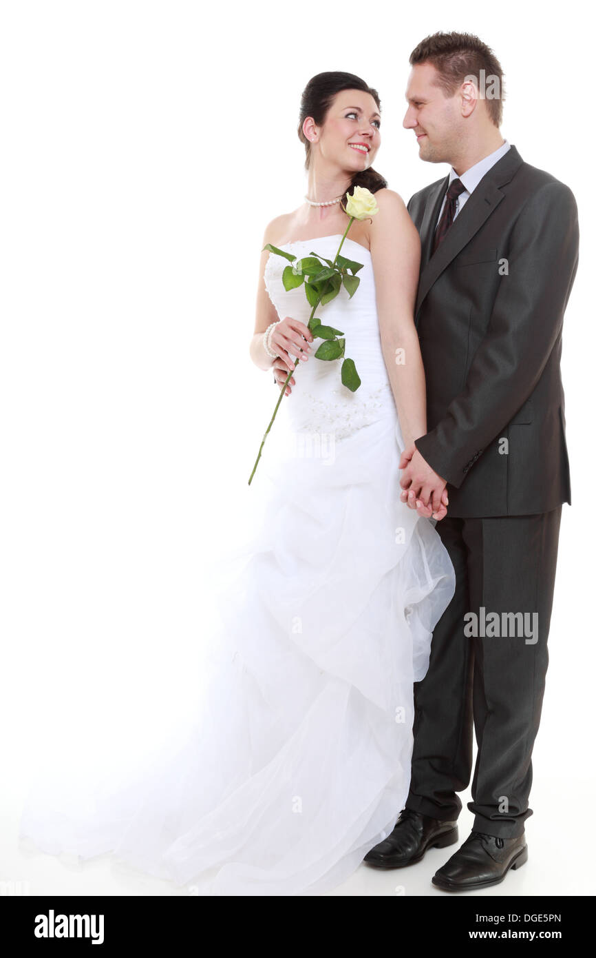 Portrait of happy bride and groom on white background Stock Photo - Alamy