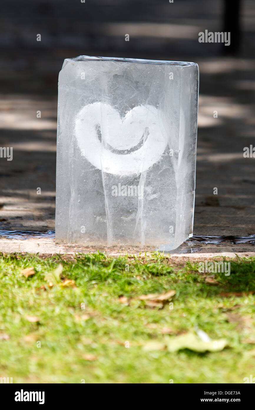 Heart shape in a block of ice Stock Photo - Alamy