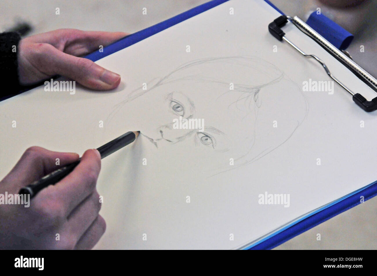 London UK, 19th Oct 2013 : Attendees learn to draw a portrait at ...