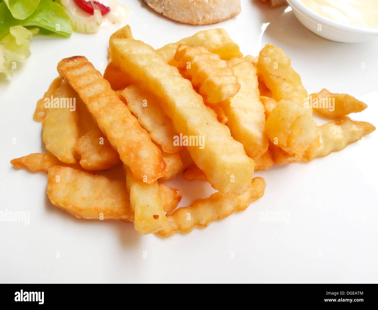 French fries on white dish Stock Photo - Alamy