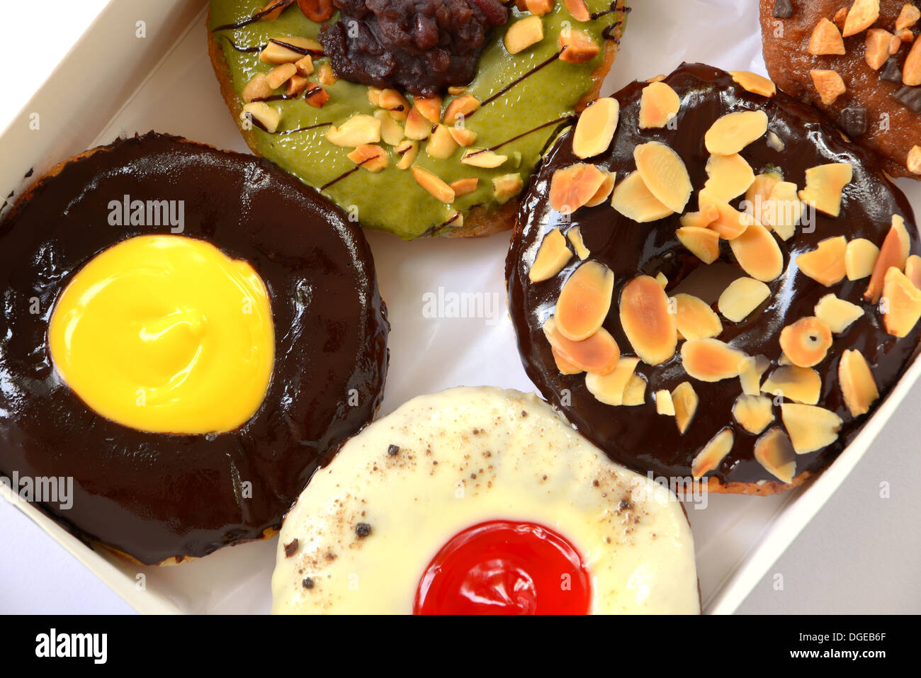 set of donuts in box close up Stock Photo - Alamy