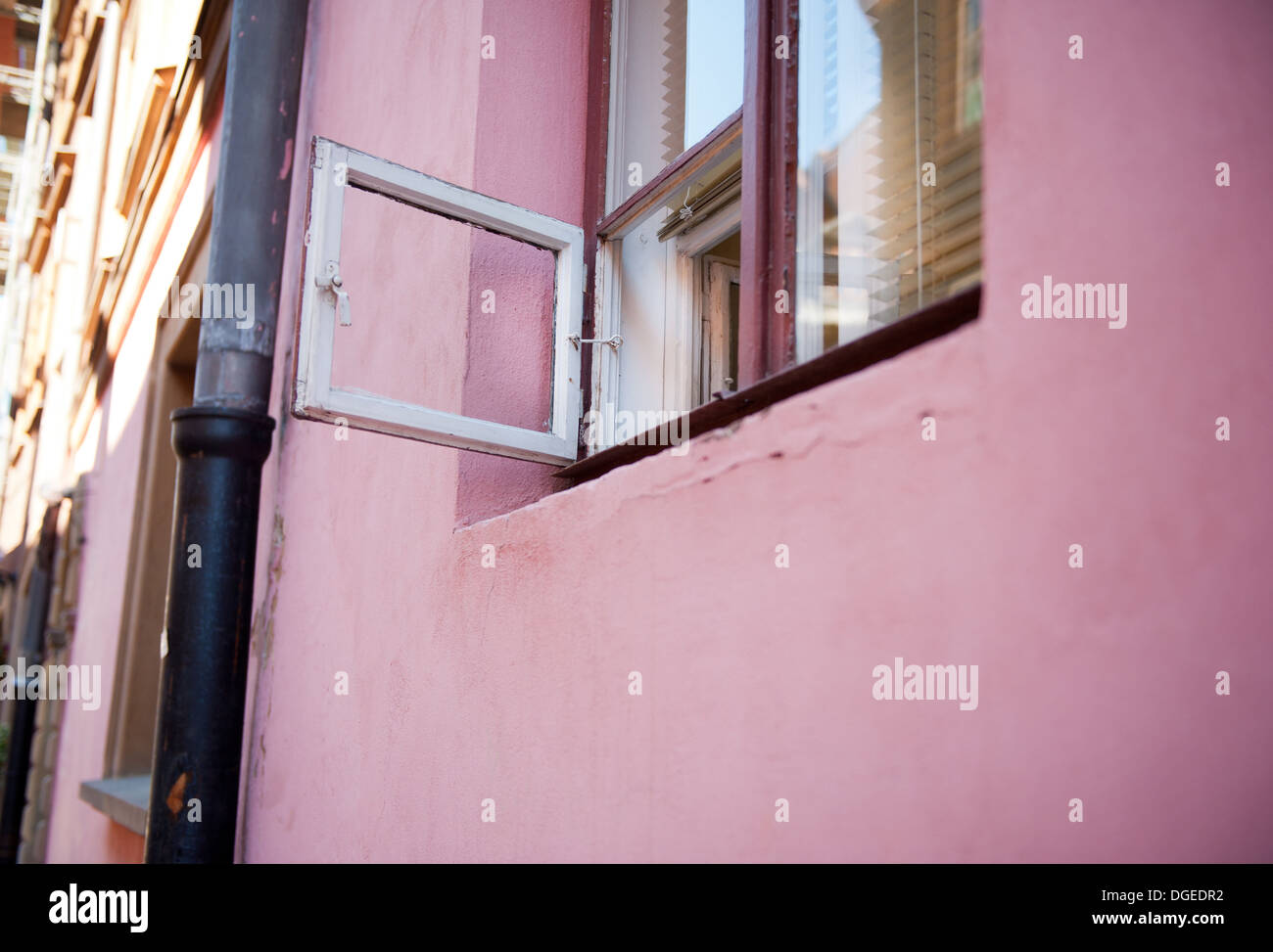 small ventilation window and pink wall in Warsaw Stock Photo - Alamy