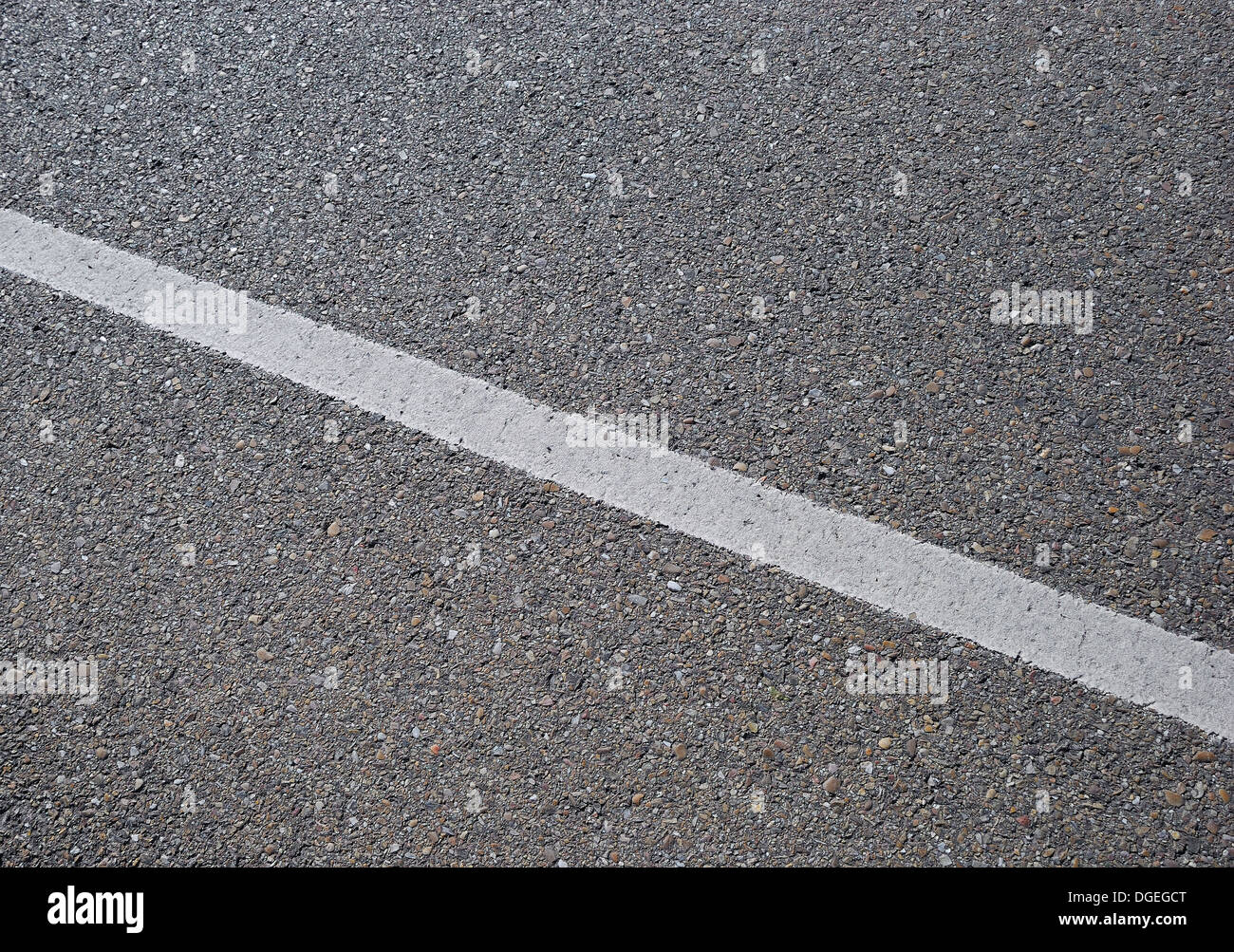 Asphalt continuous line Stock Photo - Alamy