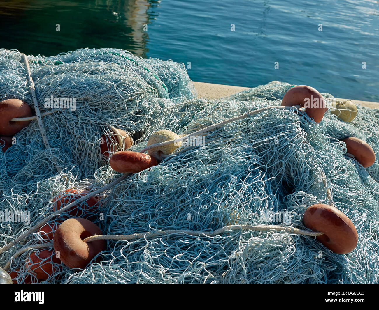 Blue fish nets hi-res stock photography and images - Alamy