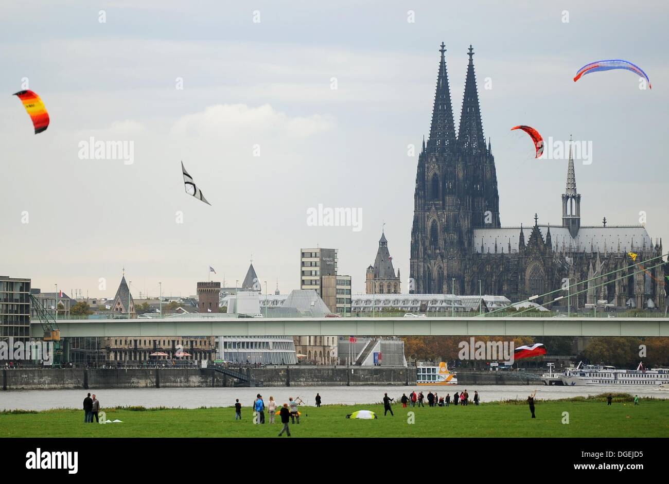 Cologne, Germany. 20th Oct, 2013. Kites fly in front of the Dome in ...