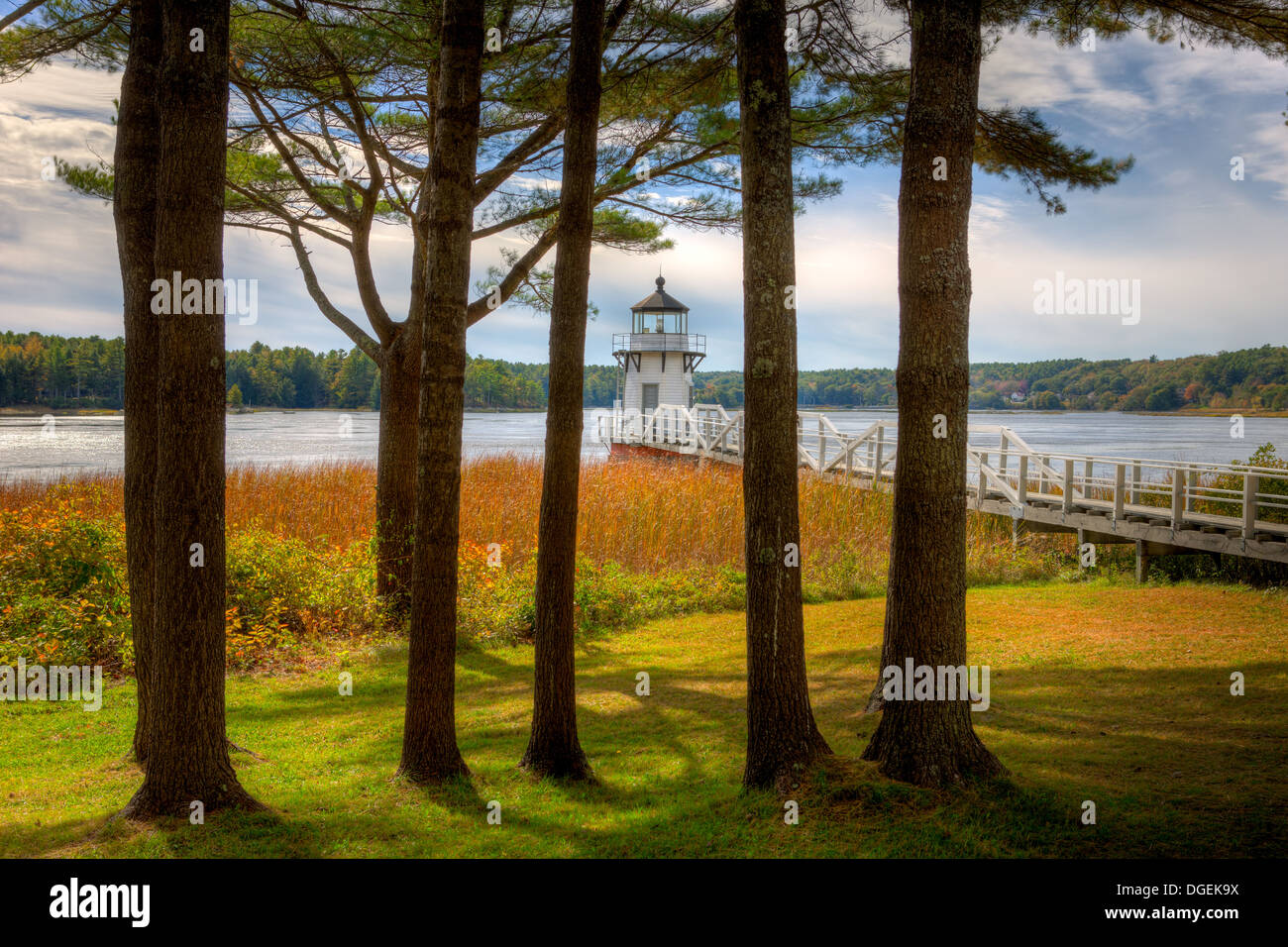 A view of the Doubling Point Lighthouse over the colorful marsh grass ...