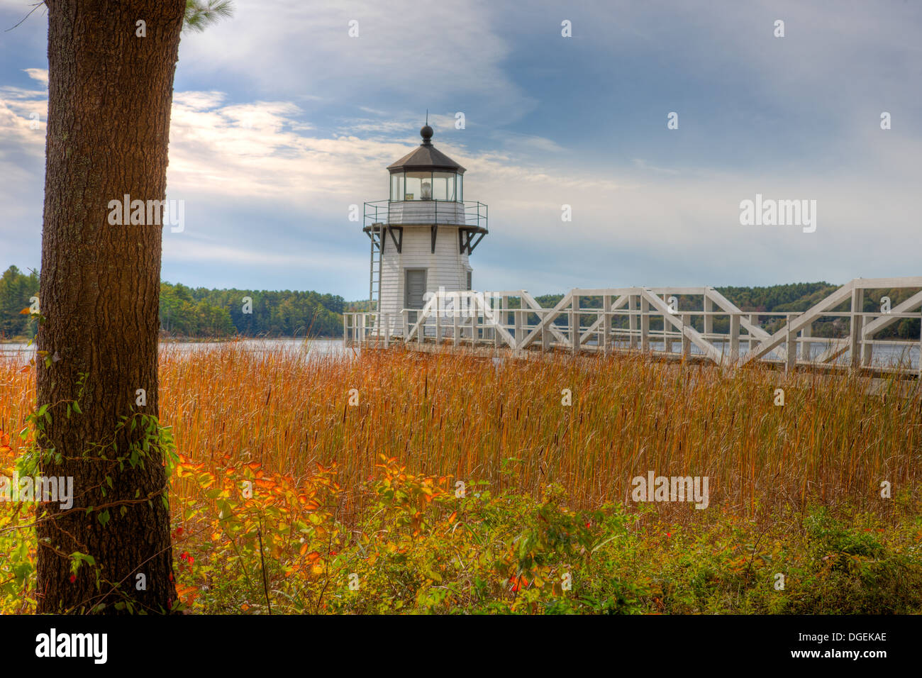 A view of the Doubling Point Lighthouse over the colorful marsh grass ...