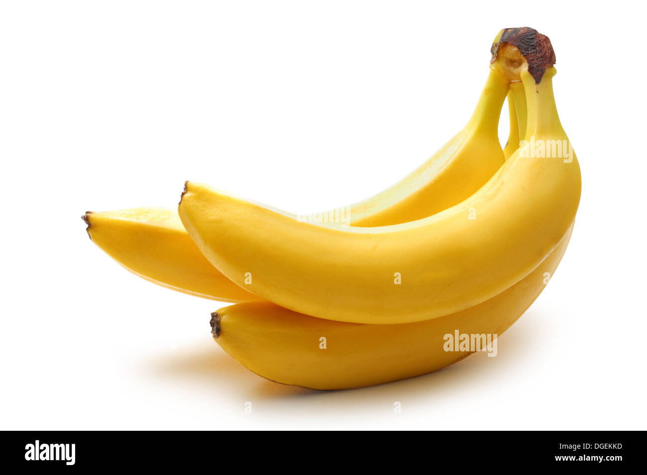 Three ripe bananas on white background Stock Photo - Alamy