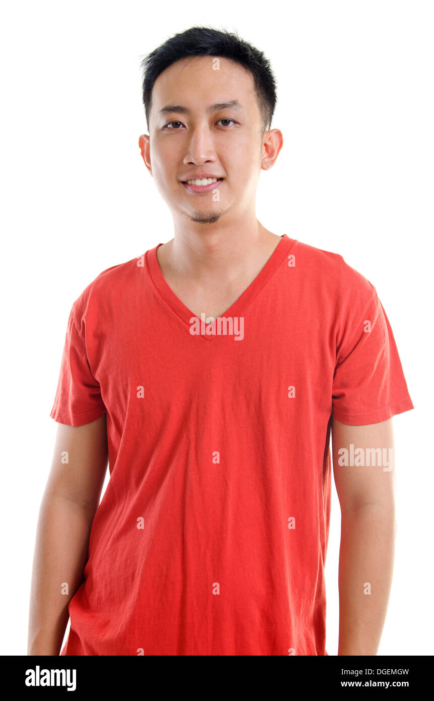 Portrait of young casual Southeast Asian man isolated over white ...