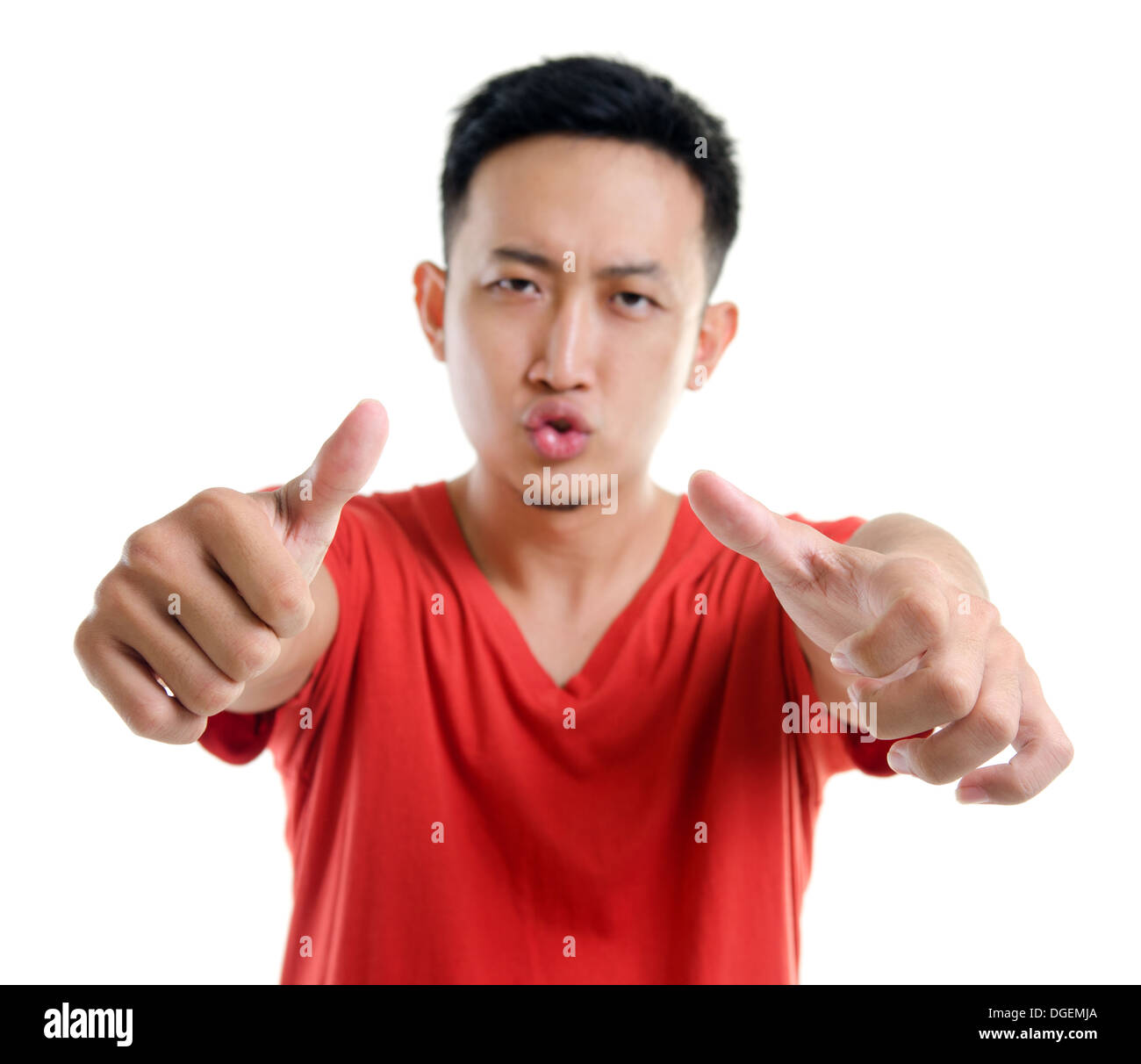 Thumbs up young Southeast Asian man isolated over white background ...