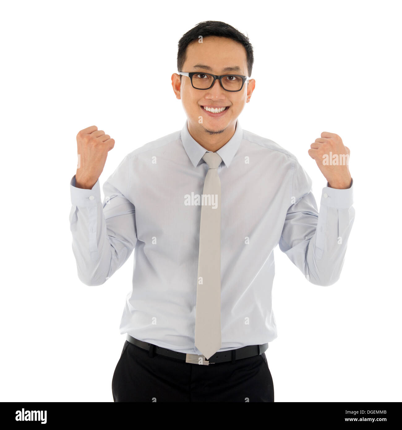 Portrait of excited Asian business male celebrating success isolated ...