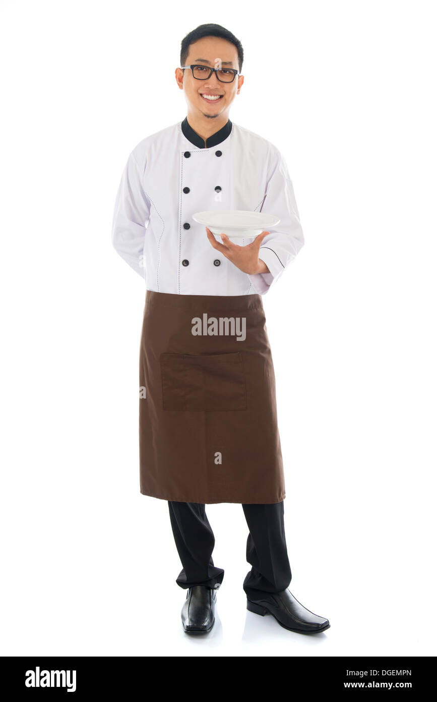 Full body Asian chef holding an empty plate, standing isolated on white ...