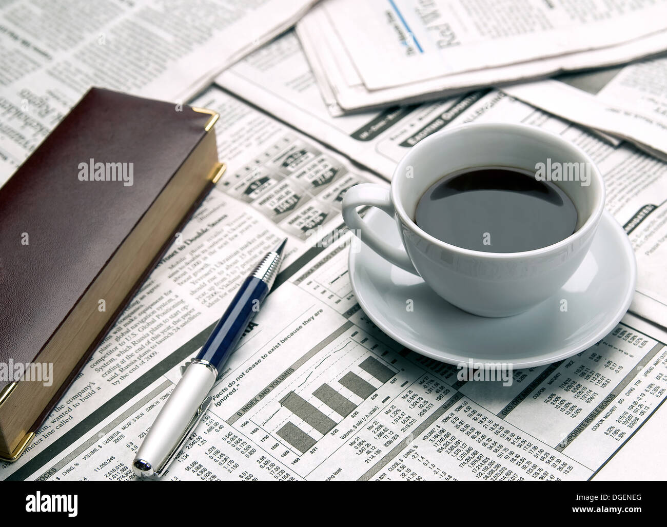 Cup of coffee on the newspaper Stock Photo - Alamy