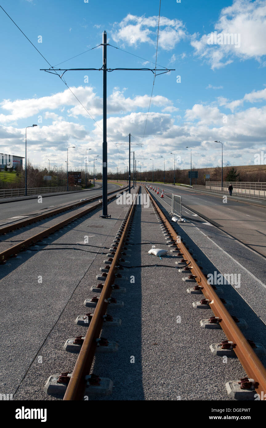 Metrolink tram tracks on Lord Sheldon Way, on the East Manchester Line ...