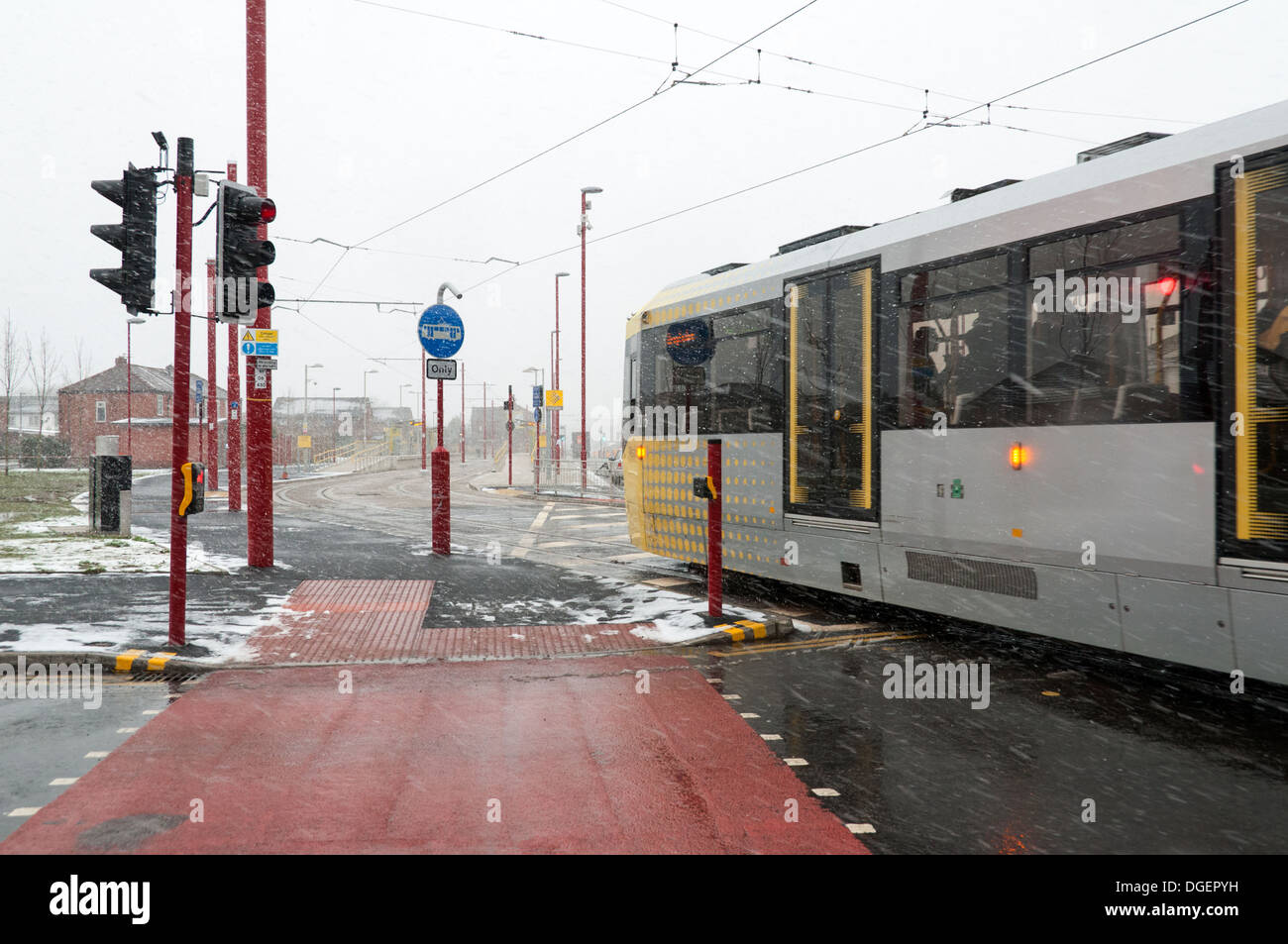 Manchester Metrolink tram in snow, during testing on the East ...