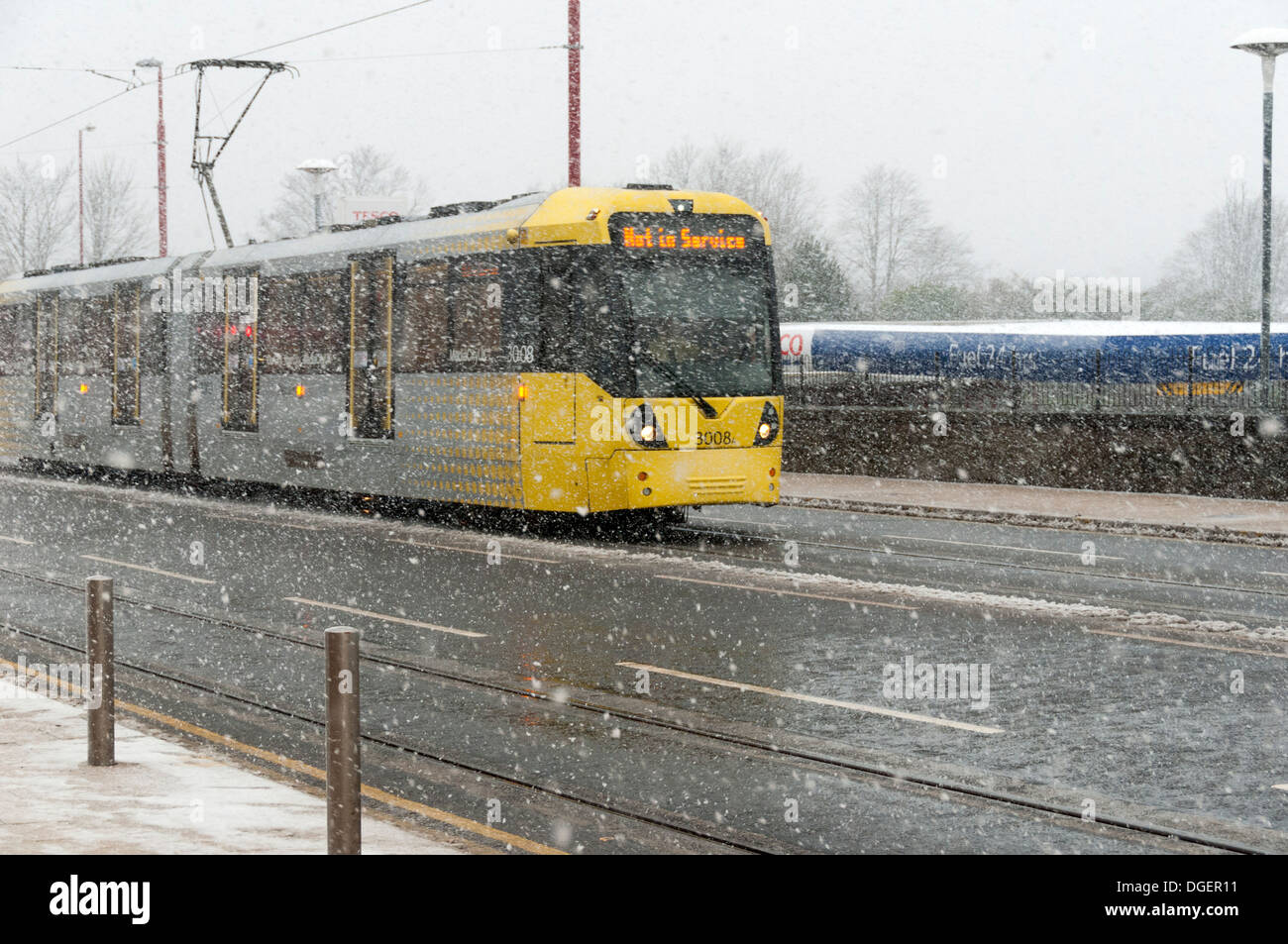 Manchester metrolink tram in snow hi-res stock photography and images ...