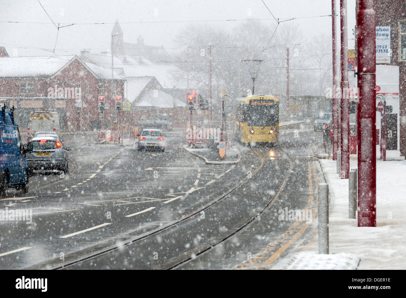 Manchester metrolink tram in snow hi-res stock photography and images ...