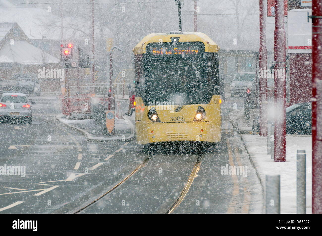 Manchester Metrolink tram in snow, during testing on the East ...