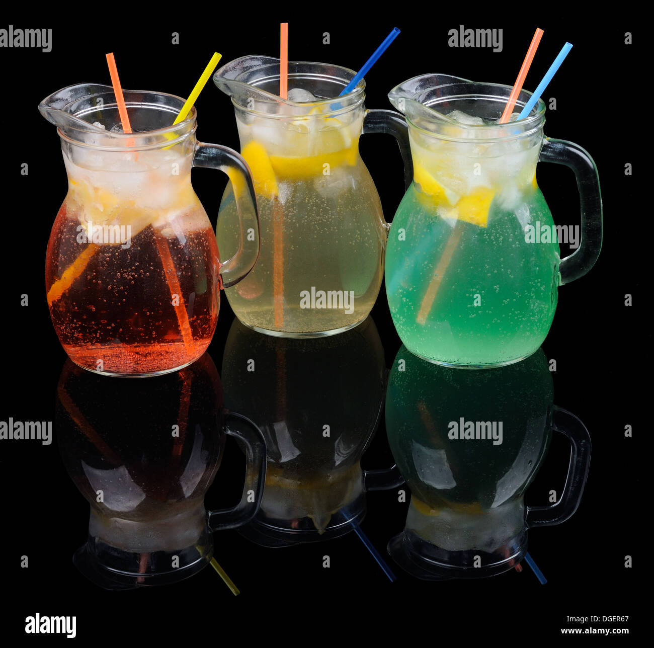 Three kinds of lemonade on black reflecting background Stock Photo - Alamy