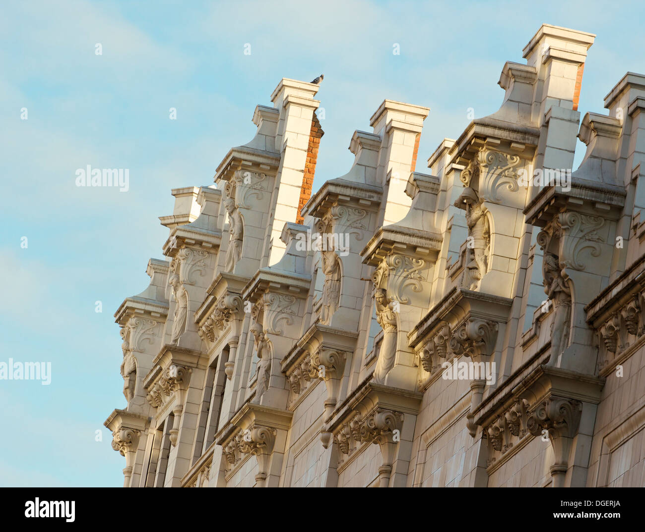 Dawn light on ornate rooftop statues sculptures Elite Building ...
