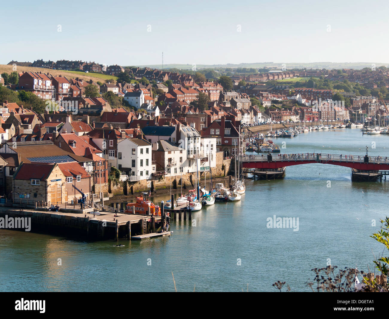 Whitby harbour with cottages on the east side of town and the swing ...