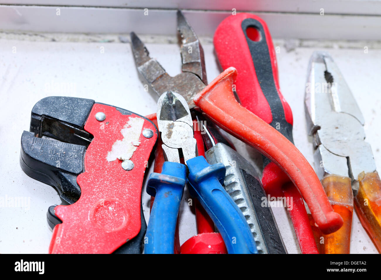 Assorted old dirty work tools instruments on construction site Stock ...