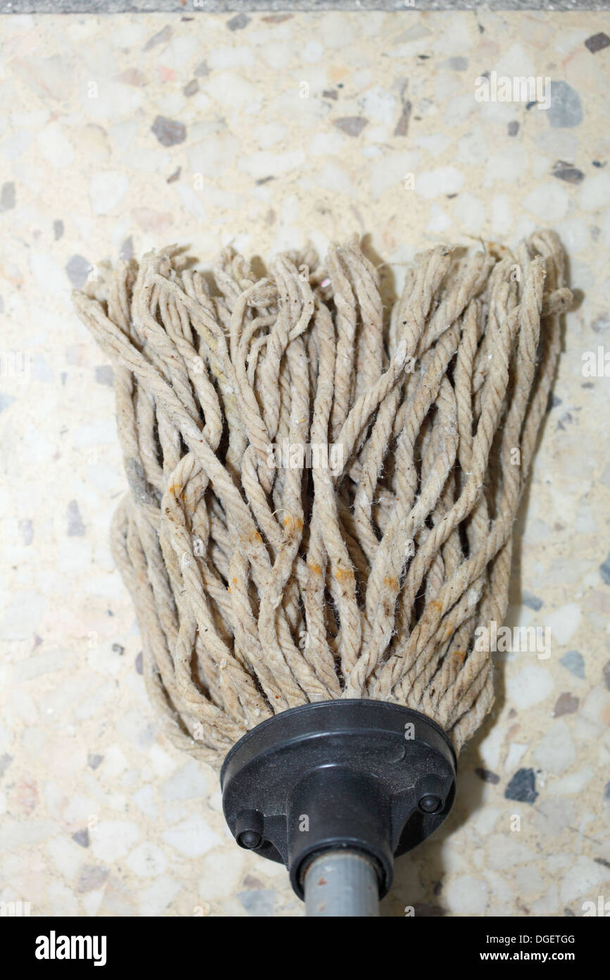 Close up cleaning the floor with a old mop, mopping housework Stock ...