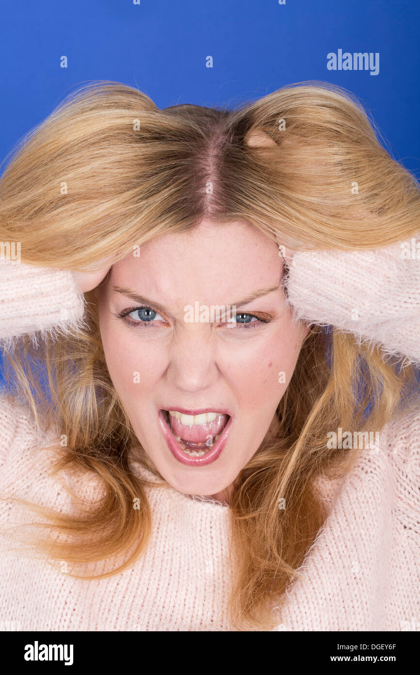 Model Released. Attractive Young Woman Screaming Stock Photo - Alamy