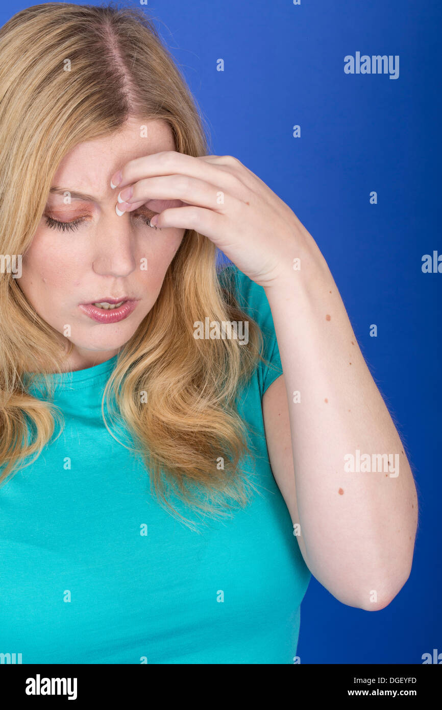 Model Released. Woman With Headache Stock Photo - Alamy