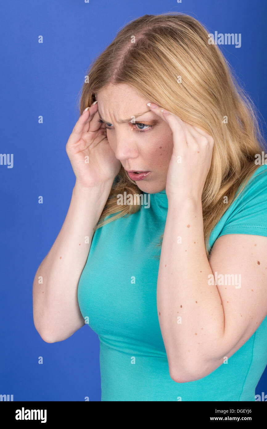 Model Released. Attractive Young Woman With Headache Stock Photo - Alamy