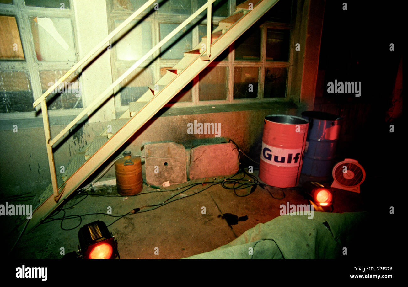 Retro industrial scene with a Gulf barrel Stock Photo - Alamy