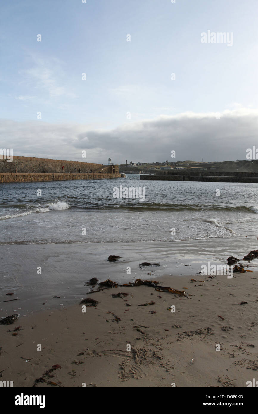 Entrance to Banff harbour with Macduff waterfront Scotland October 2013 ...