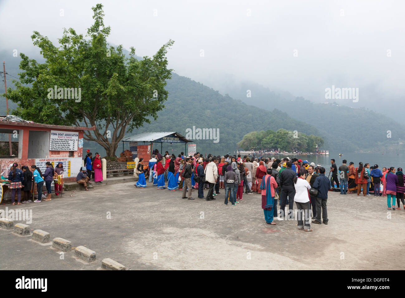 Deovtees waiting for a boat ride to Tal Barahi Temple on Phewa Lake ...