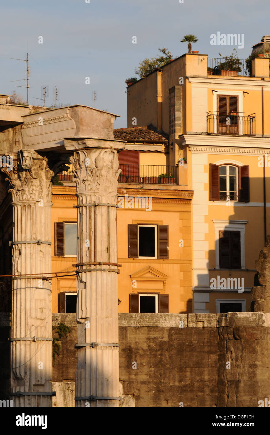 Roman ruins next to Italian buildings Stock Photo - Alamy