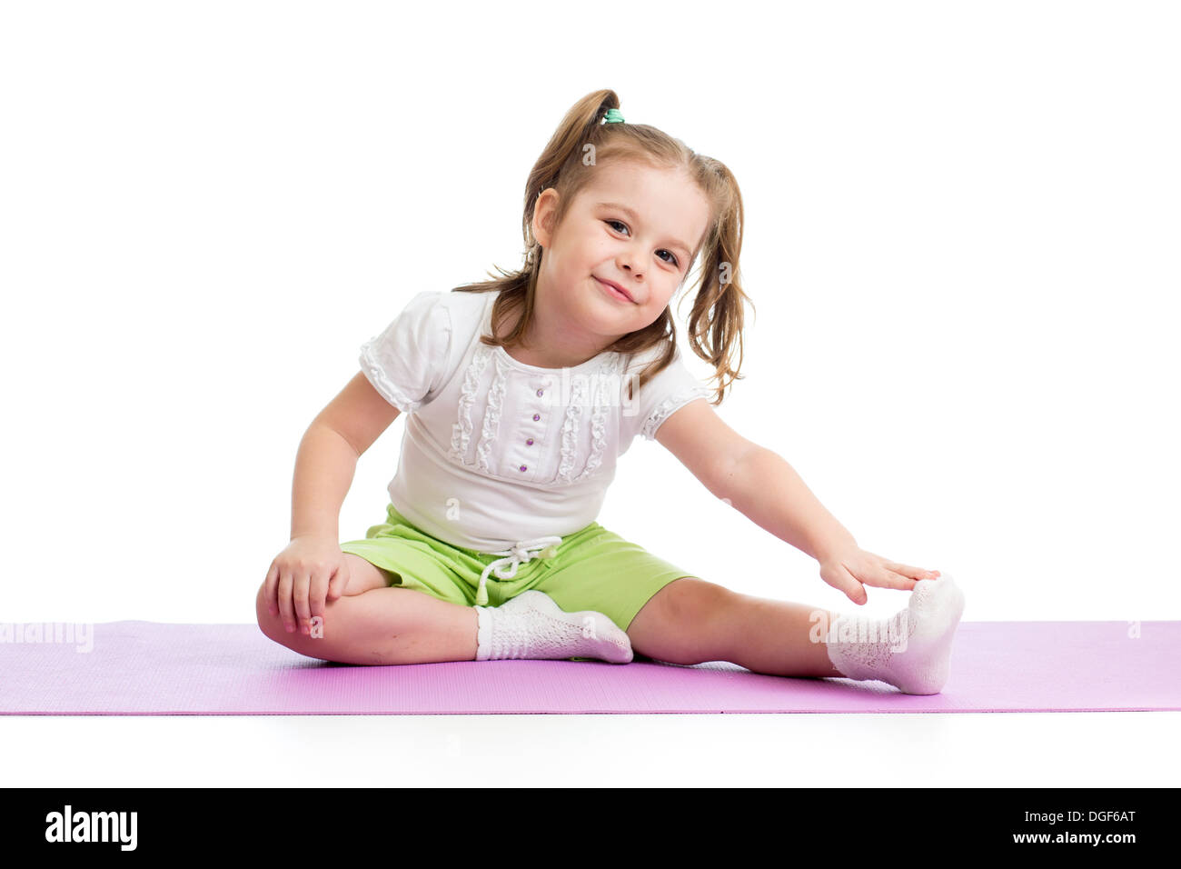 Kid girl doing fitness exercises Stock Photo - Alamy