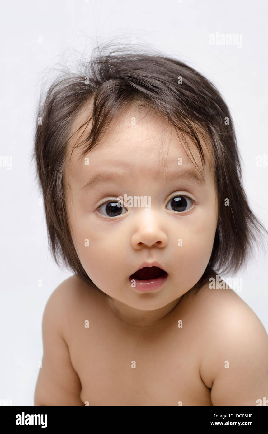 Baby six-months-old surprised Stock Photo - Alamy