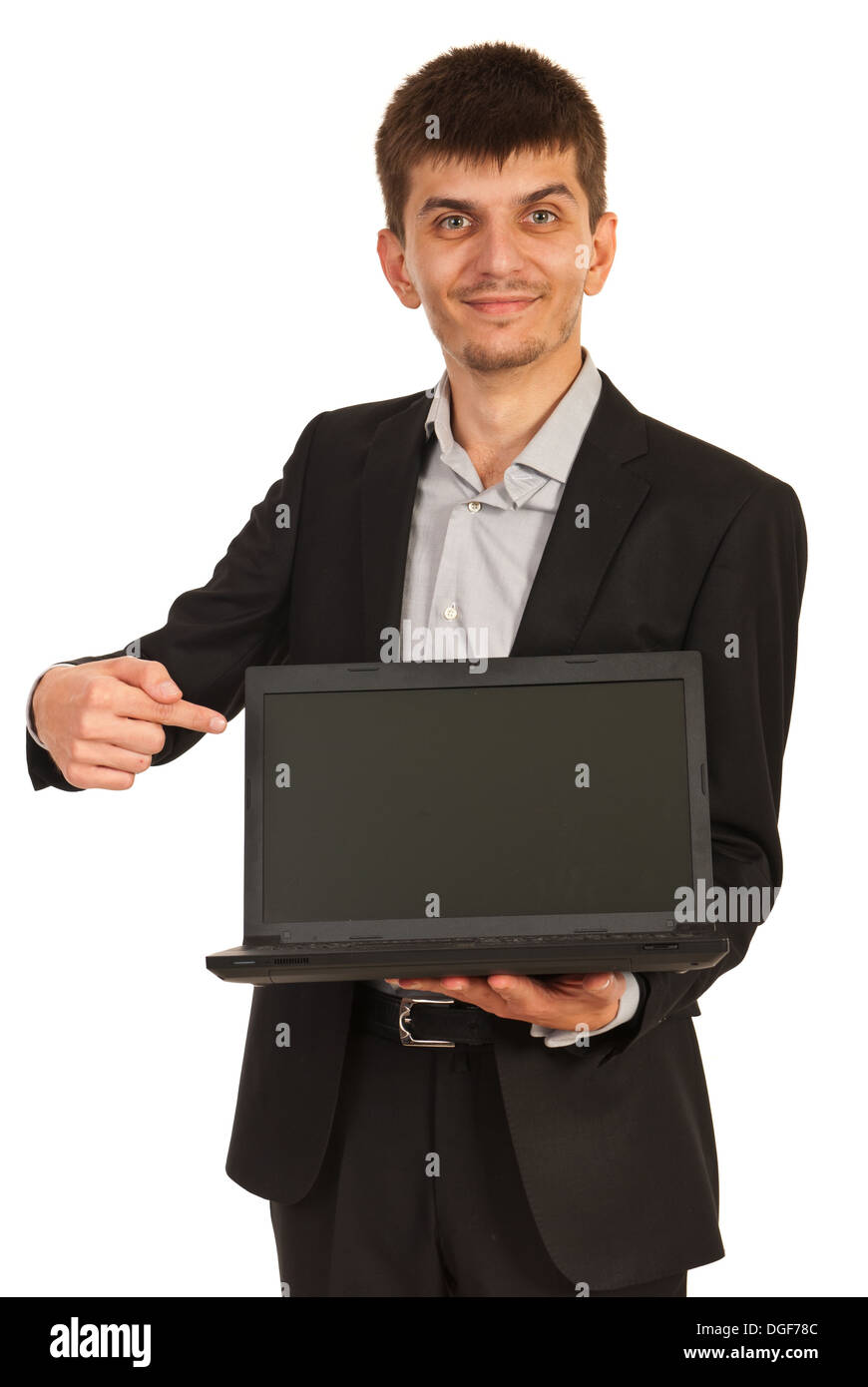 Business man pointing to laptop screen isolated on white background ...