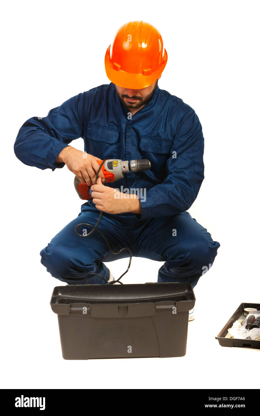 Worker man with tools box isolated on white background Stock Photo - Alamy