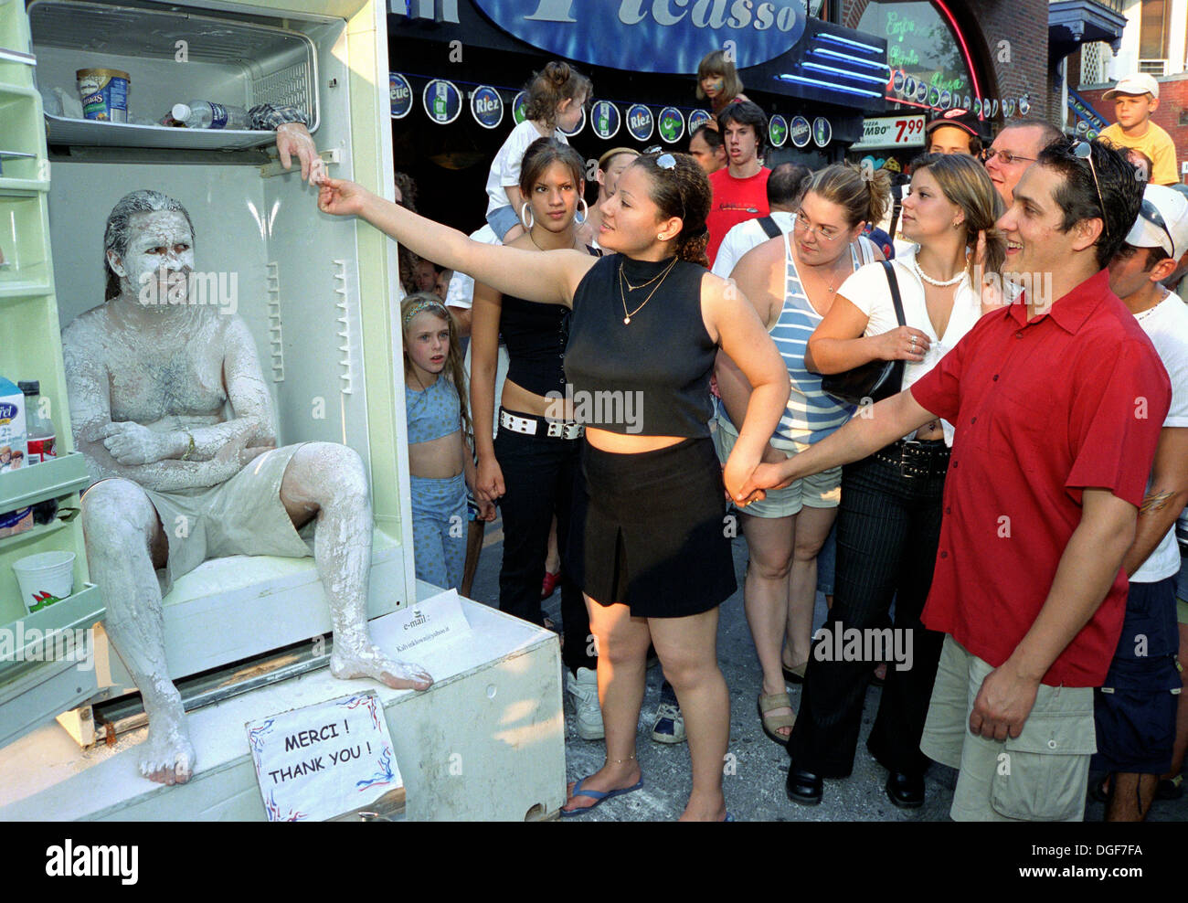 Man in refrigerator. Human statue performing in downtown Montreal ...