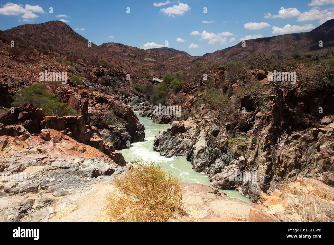 Kunene River directly on the border between Namibia and Angola, Epupa ...