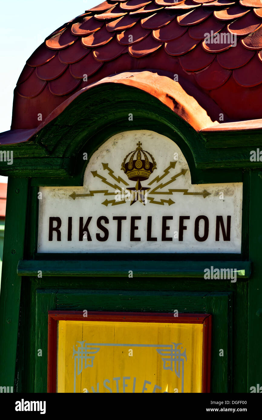 Old Swedish telephone booth. Green with a sign " Rikstelefon Stock ...