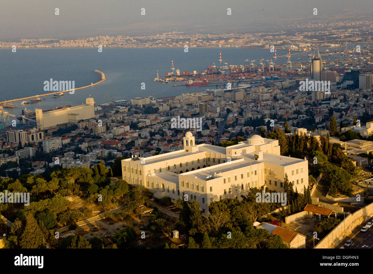 An aerial photo of Haifa cityscape- the bay, the port, Dagon building ...