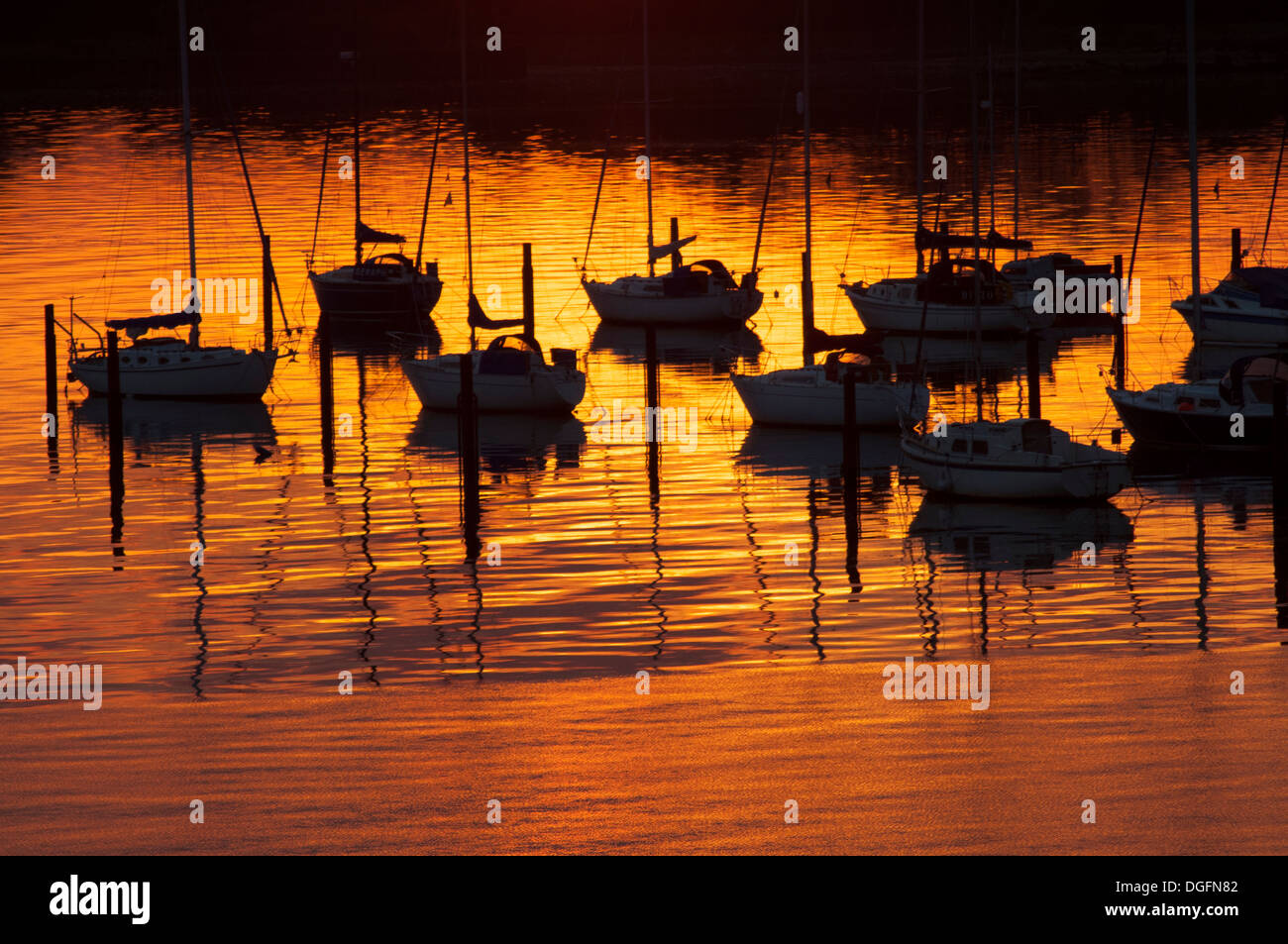 Boats water sunset red hi-res stock photography and images - Alamy