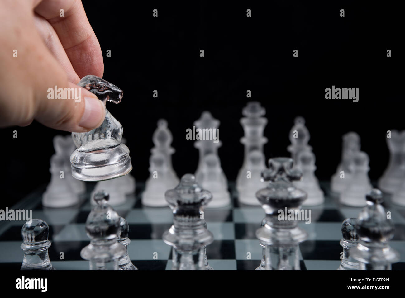chess move with modern glass chess board, knight Stock Photo - Alamy