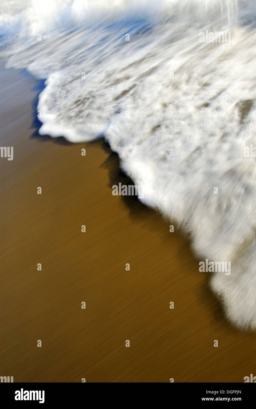 Wave splashing onto beach hi-res stock photography and images - Alamy
