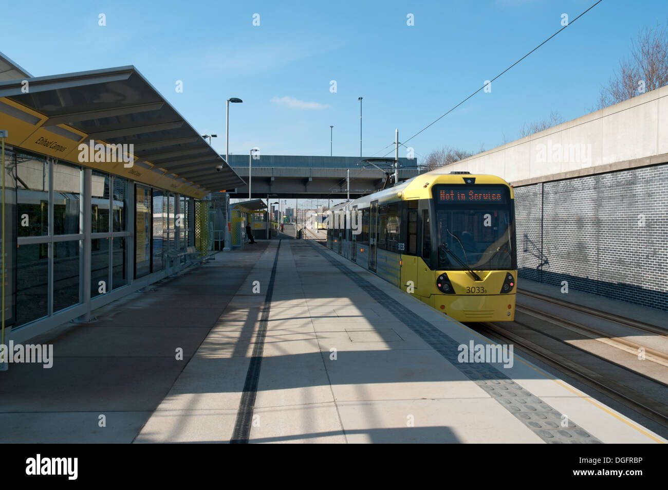 Metrolink tram at the Etihad Campus stop, on the East Manchester Line ...